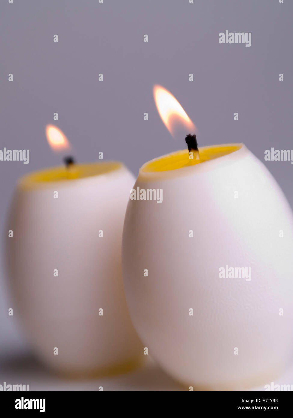 Close-up of lit egg shaped candles Stock Photo - Alamy