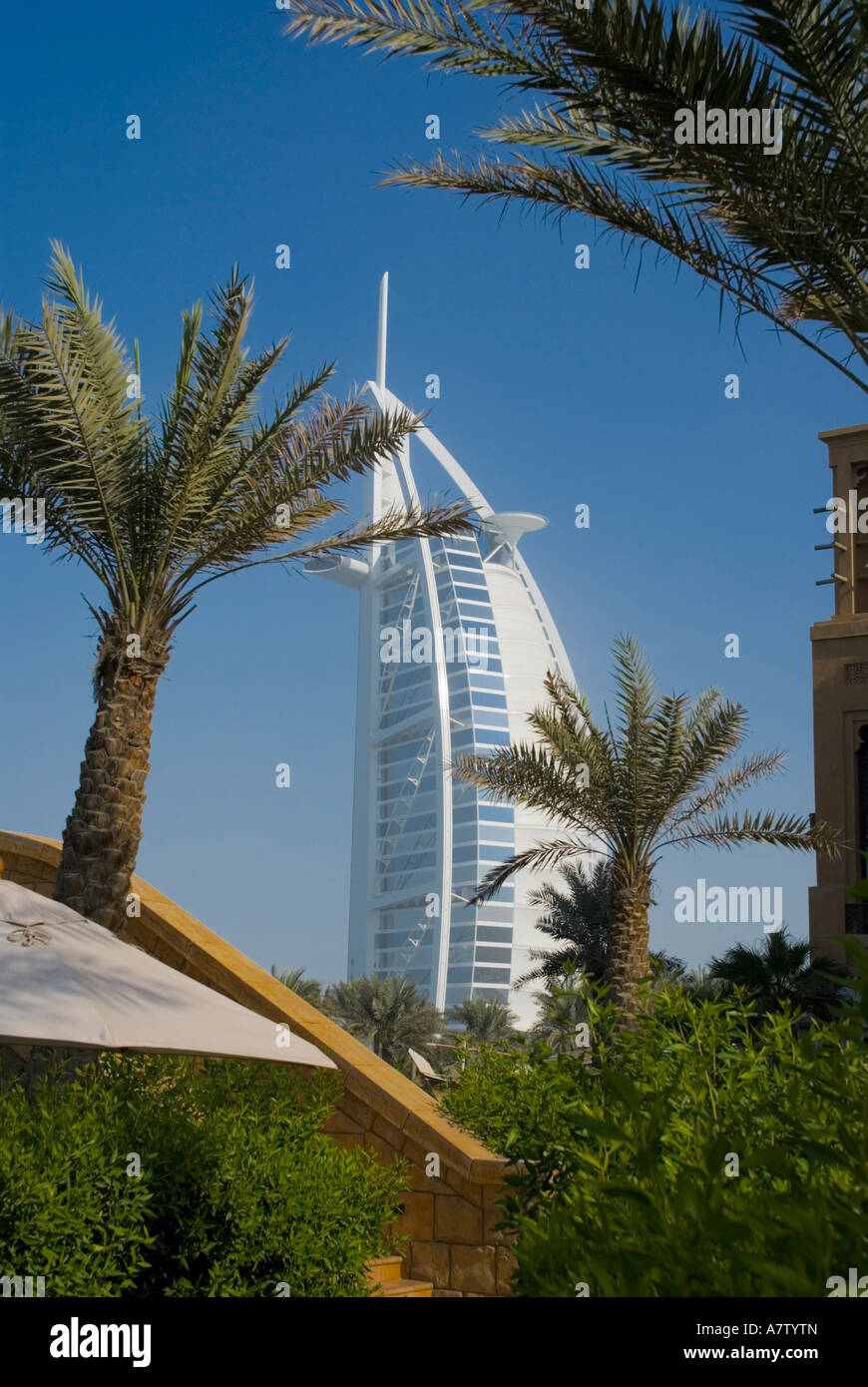 Trees with hotel in background, Burj Al Arab Hotel, Dubai, United Arab ...