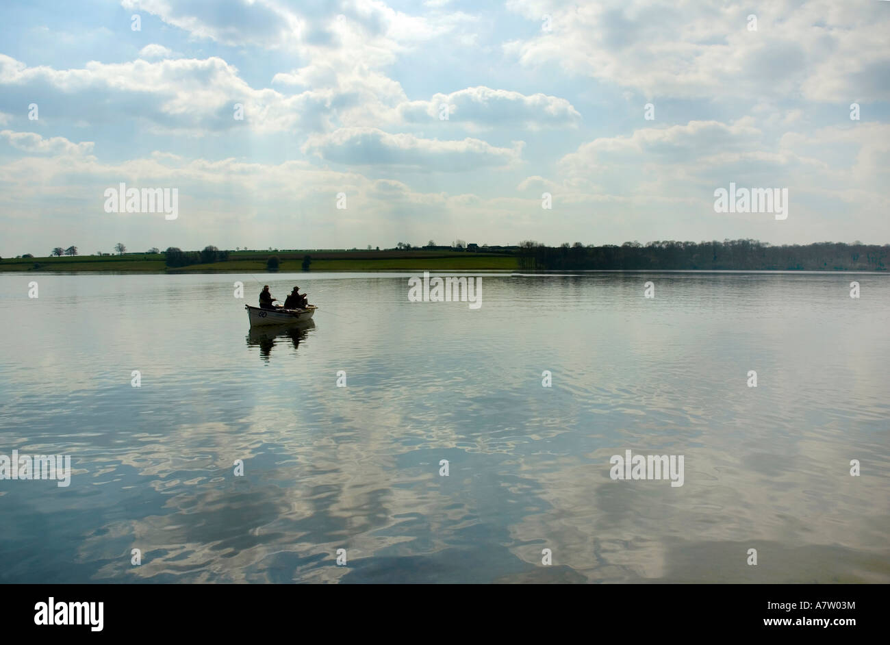 A landscape view of trout fishermen over Rutland Water Stock Photo - Alamy