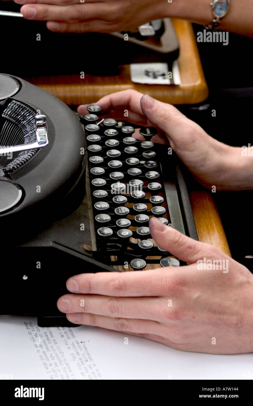 Antique a manual typewriter is used to write letters to members of ...