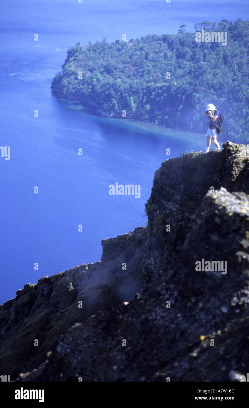 Tourist in crater of Api volcano Api island Banda islands Moluccas ...