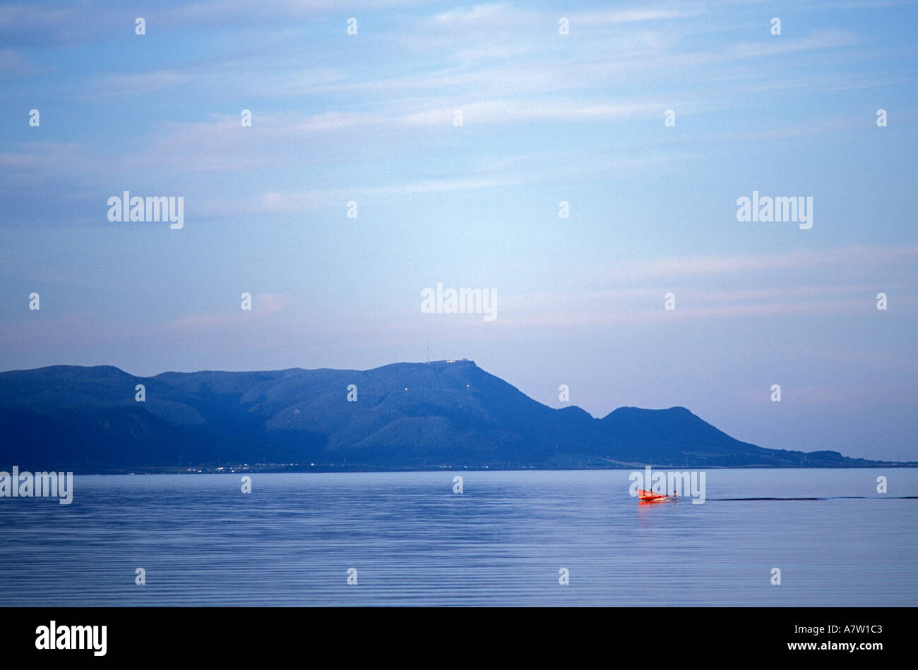 lobster fisherman on the bay of chaleur with Gaspe Peninsula in ...