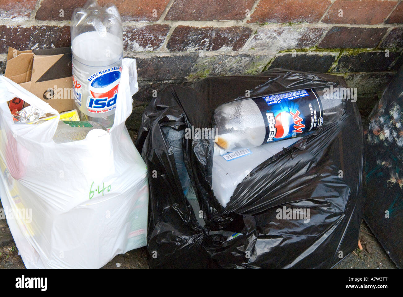 Rubbish Bags in Back Alley Stock Photo - Alamy
