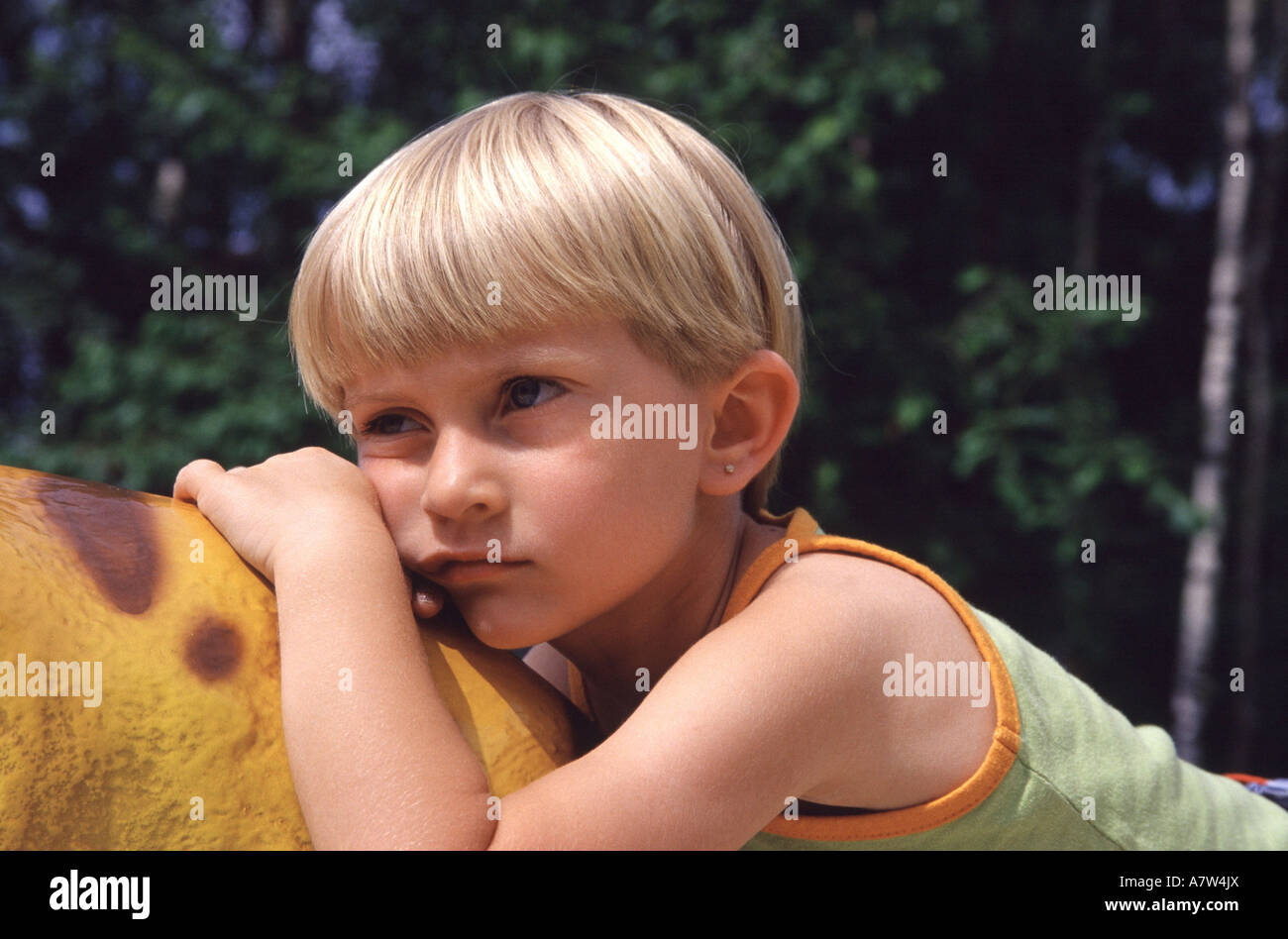 Bored child dreaming Stock Photo - Alamy