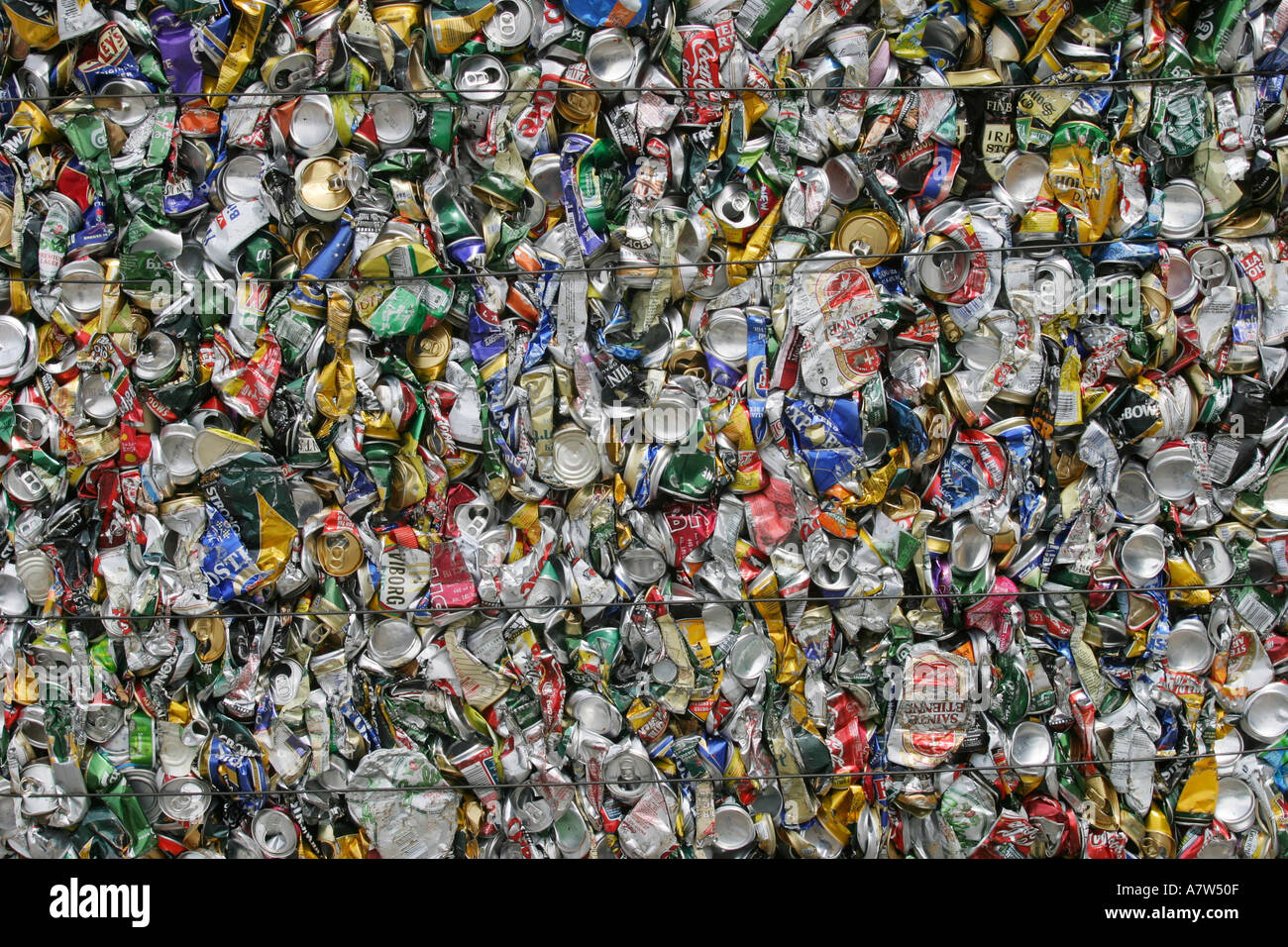 Metal cans crushed ready for recycling Stock Photo - Alamy