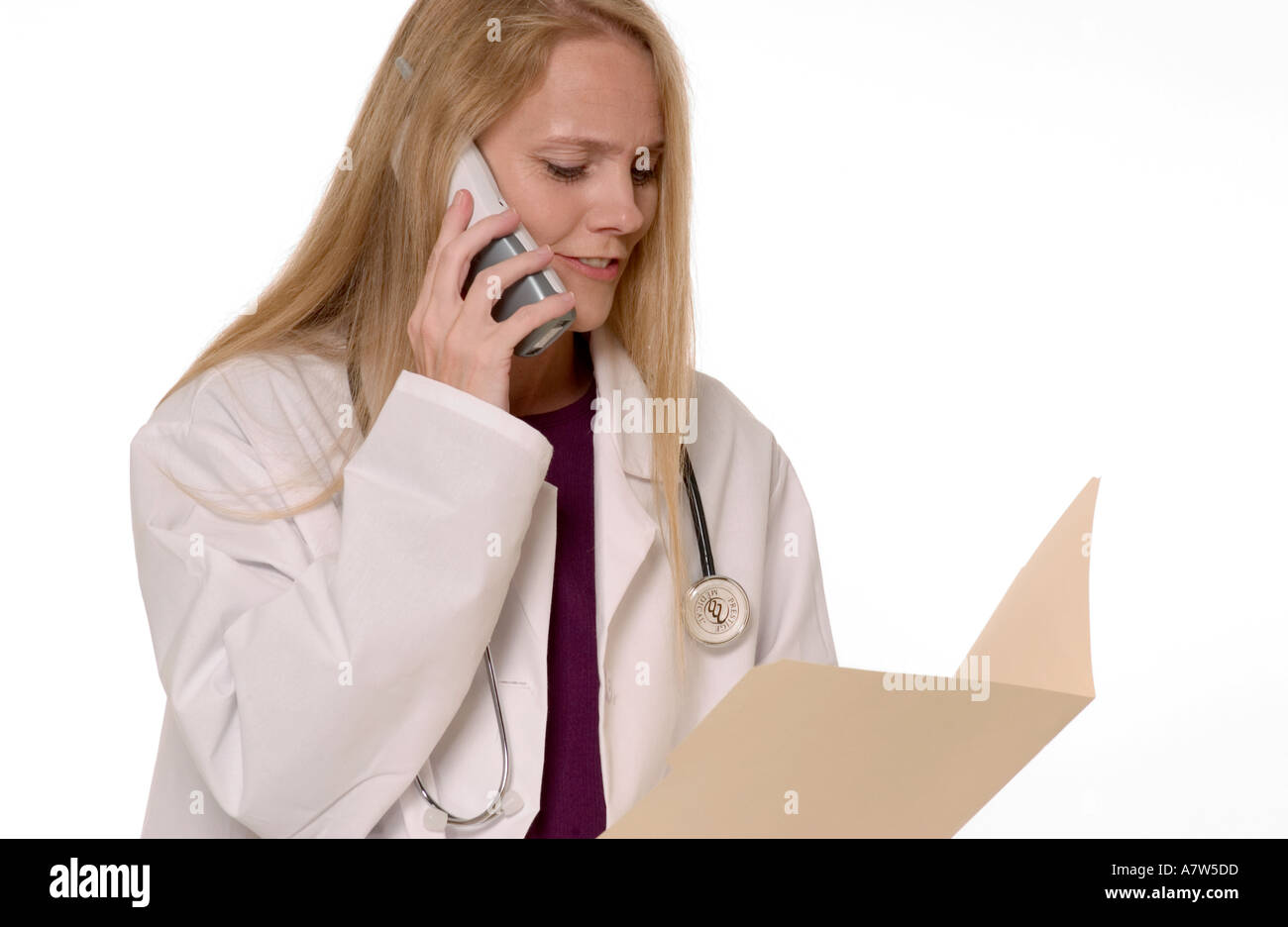 Female doctor multitasking hi-res stock photography and images - Alamy
