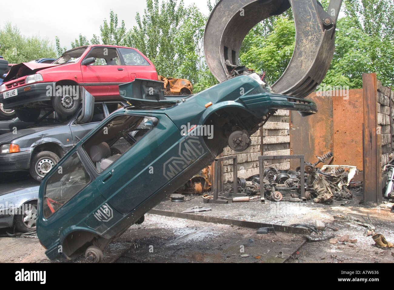 Car being dismantled for recycling Stock Photo - Alamy