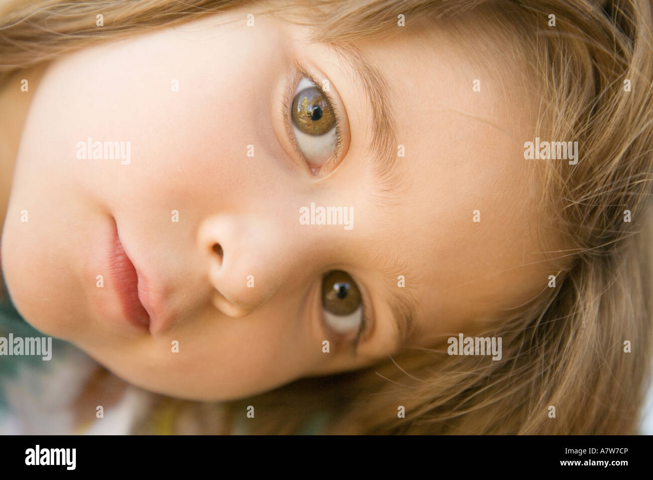 Girl tilting head hi-res stock photography and images - Alamy