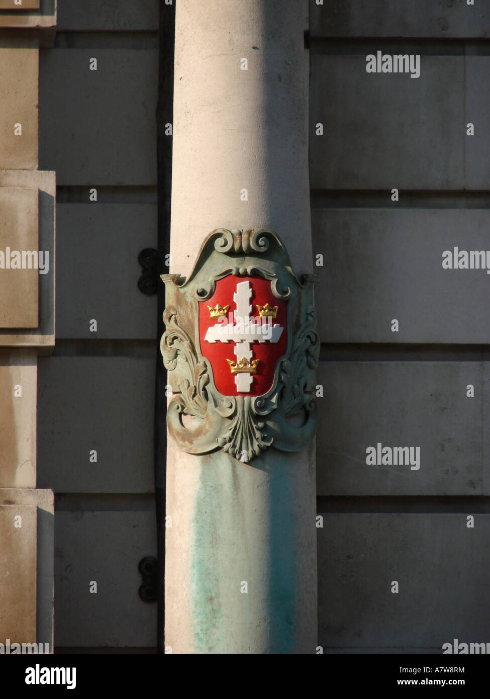 The cross and three crown's Emblem of Colchester on a signpost Stock ...
