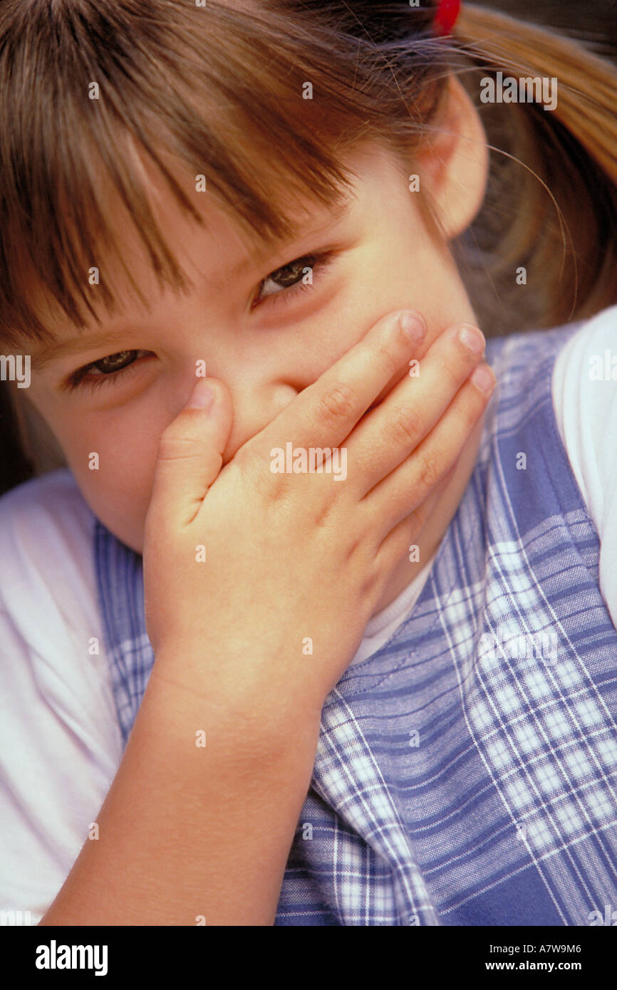 Shy child giggling hi-res stock photography and images - Alamy