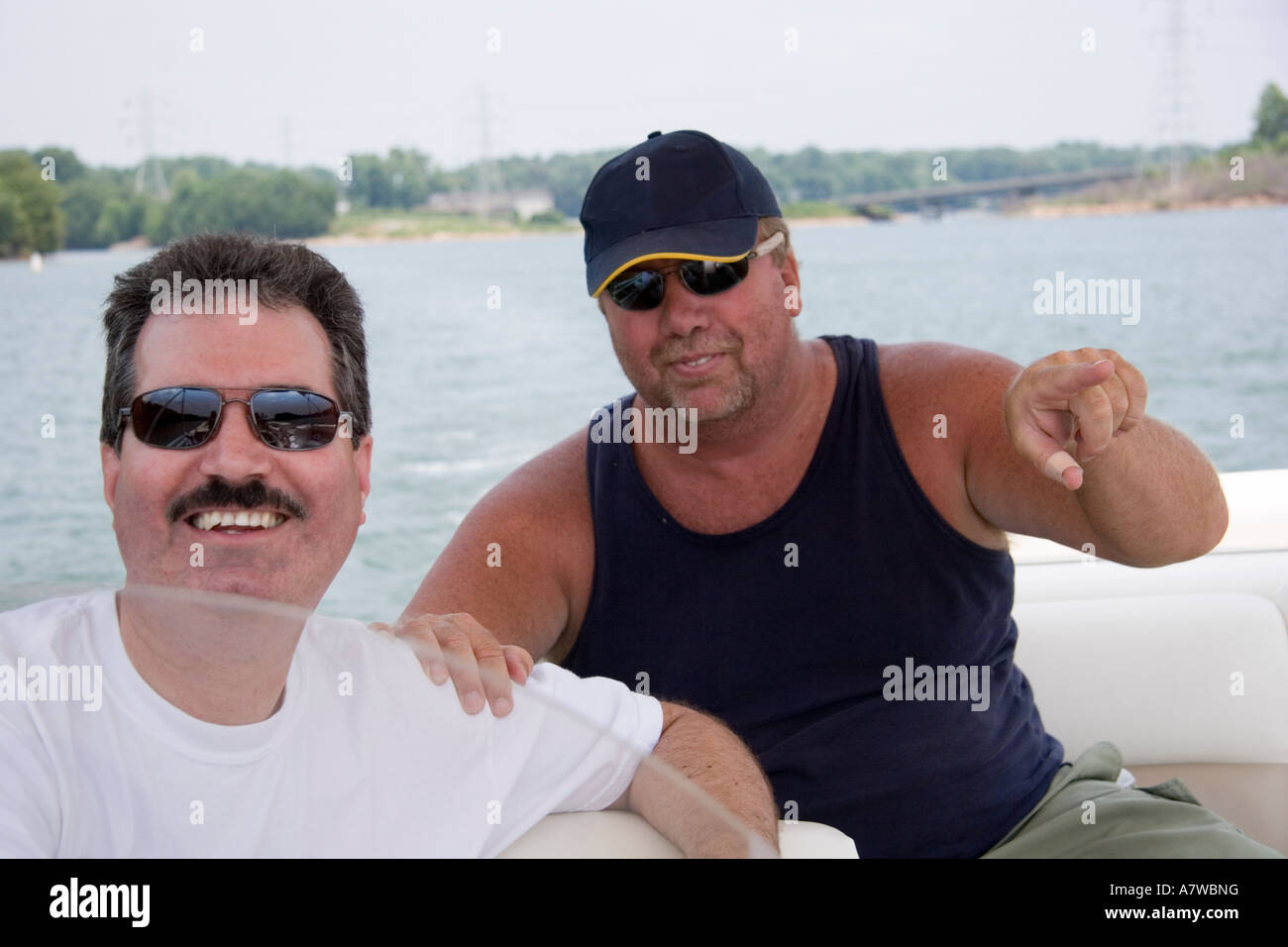 Two men boating Stock Photo - Alamy