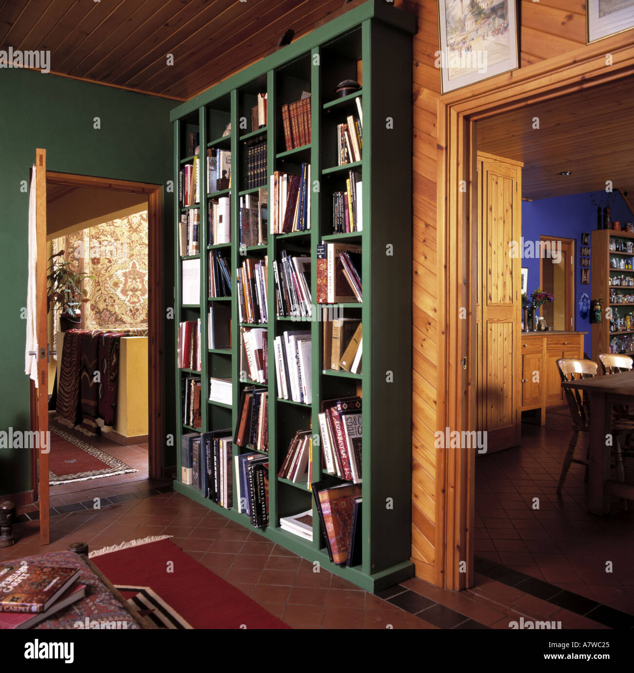 Green Bookcase in Hallway Stock Photo - Alamy