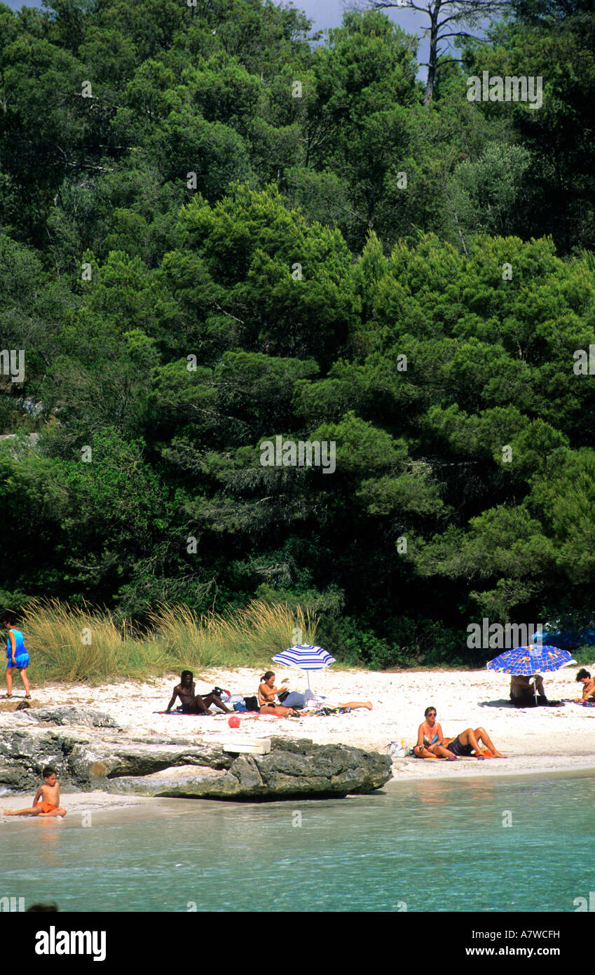 Tourists in beach or Cala Turqueta Minorca Balearic islands Spain Stock ...