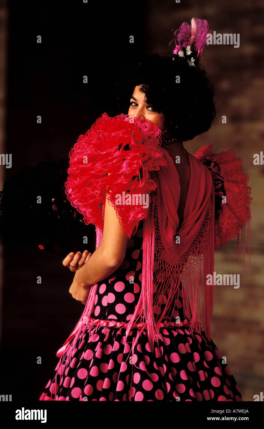 Spain, Andalusia, Sevilla, an Andalusian woman in a traditional costume ...