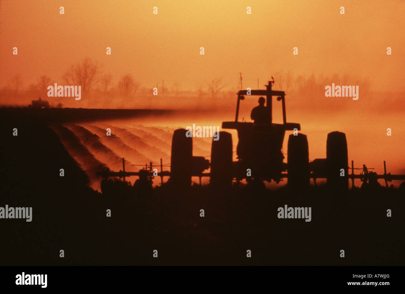 Tractor discing cotton field Mississippi USA Stock Photo - Alamy