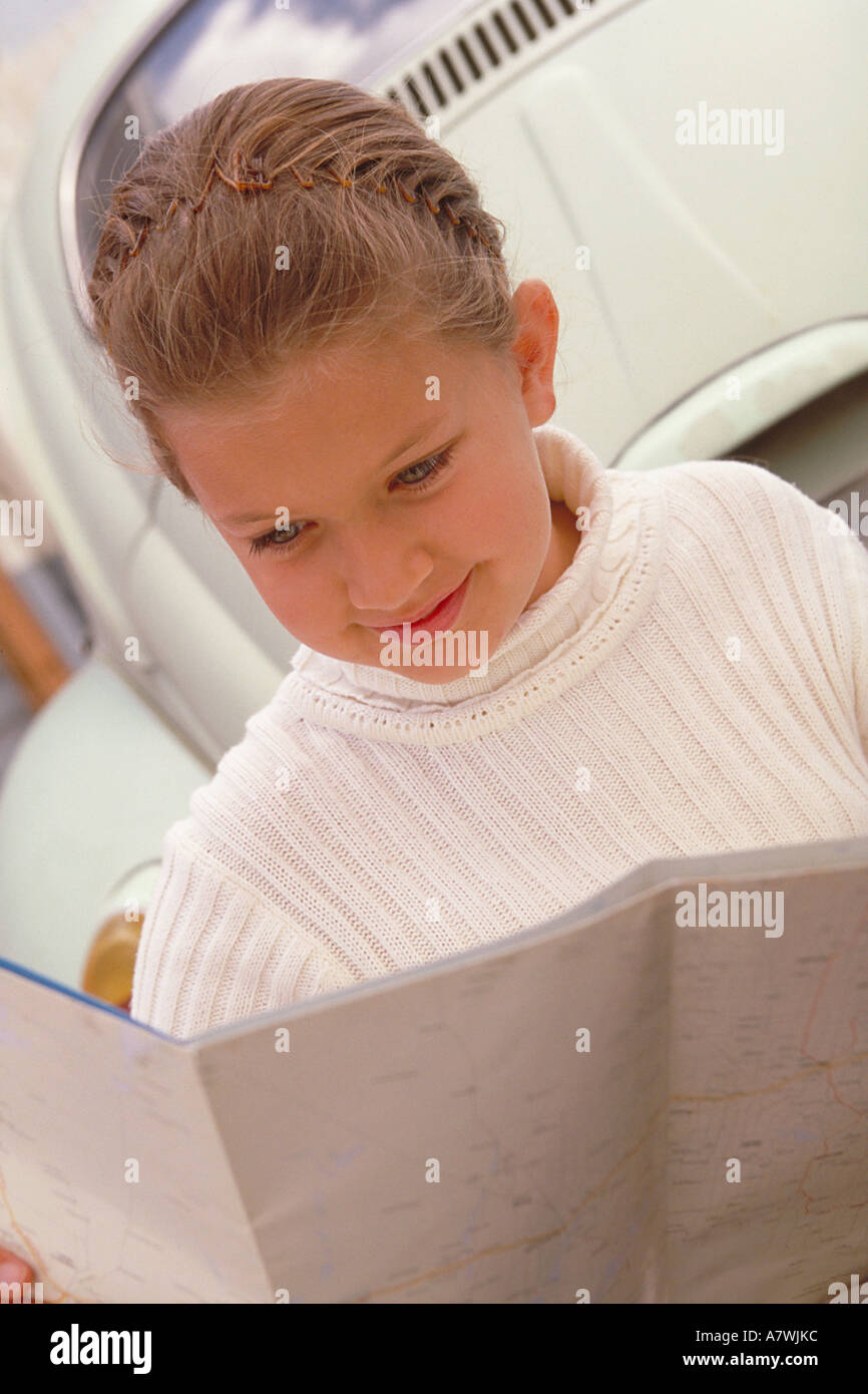 Concentrated blond girl reading hi-res stock photography and images - Alamy