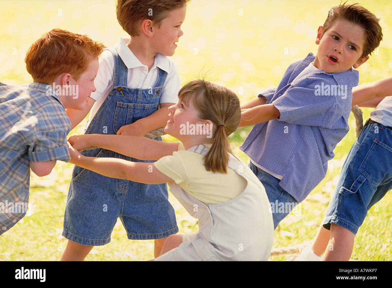 group of children pulling a rope Stock Photo - Alamy