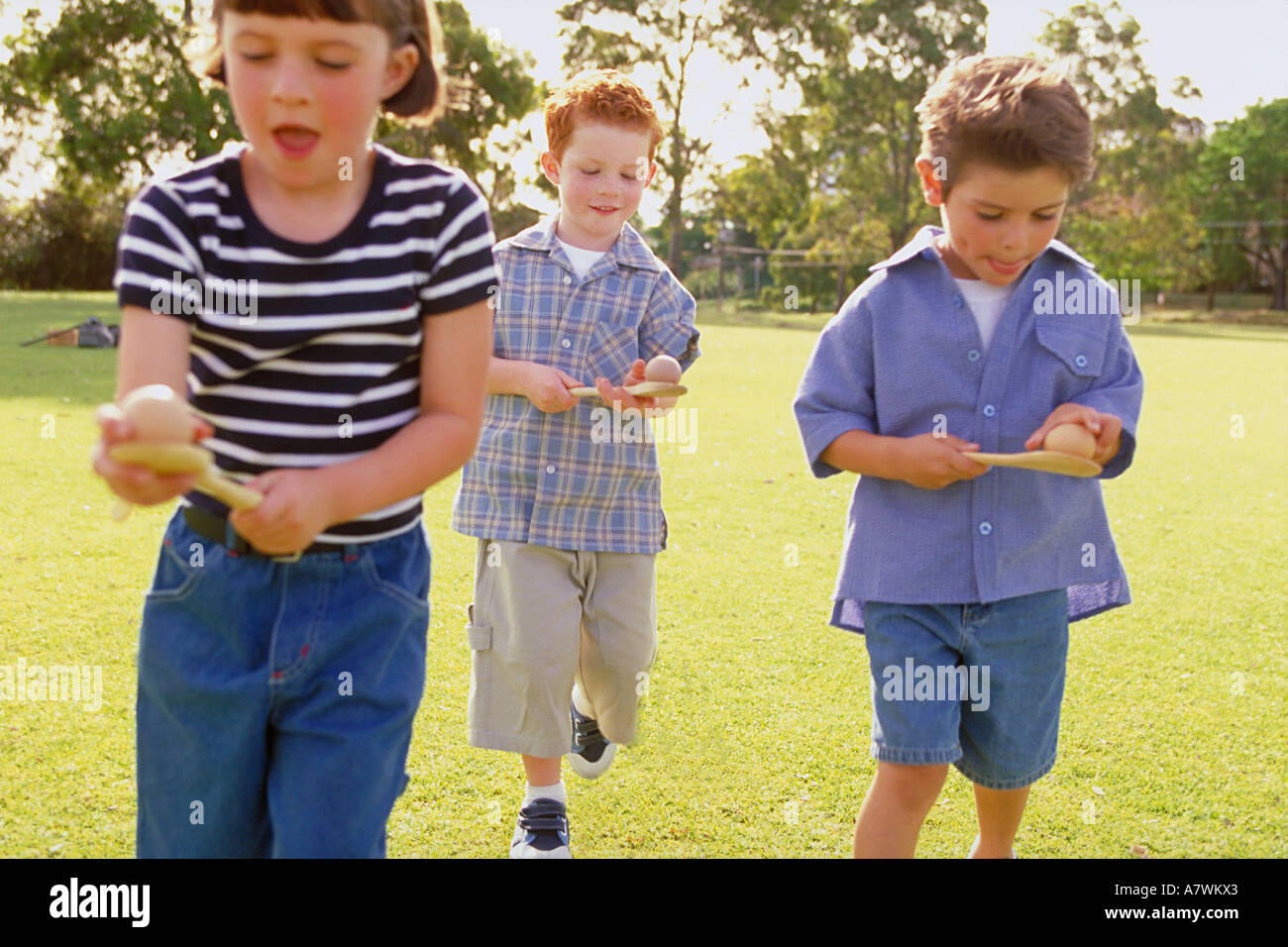 Children running over meadow hi-res stock photography and images - Alamy
