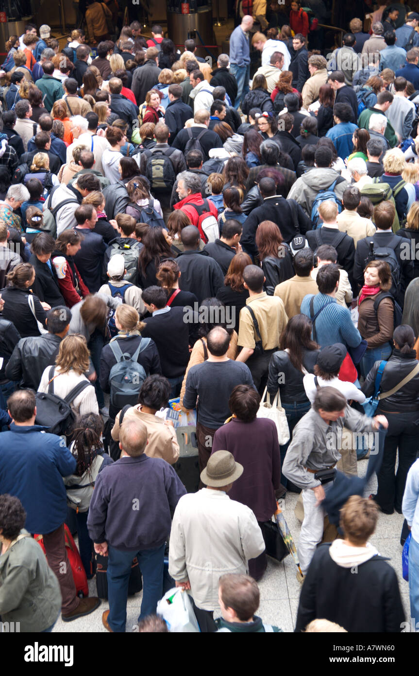 Crowd of passengers queuing from above for the trains at Waterloo ...