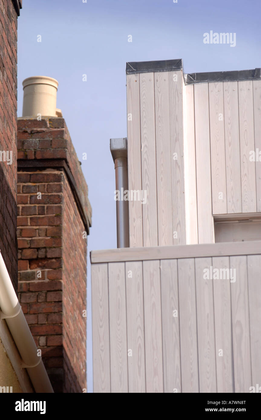 A CONTEMPORARY GEOMETRIC HOME WITH WOOD CLADDING AN ALUMASC ALUMINIUM ...