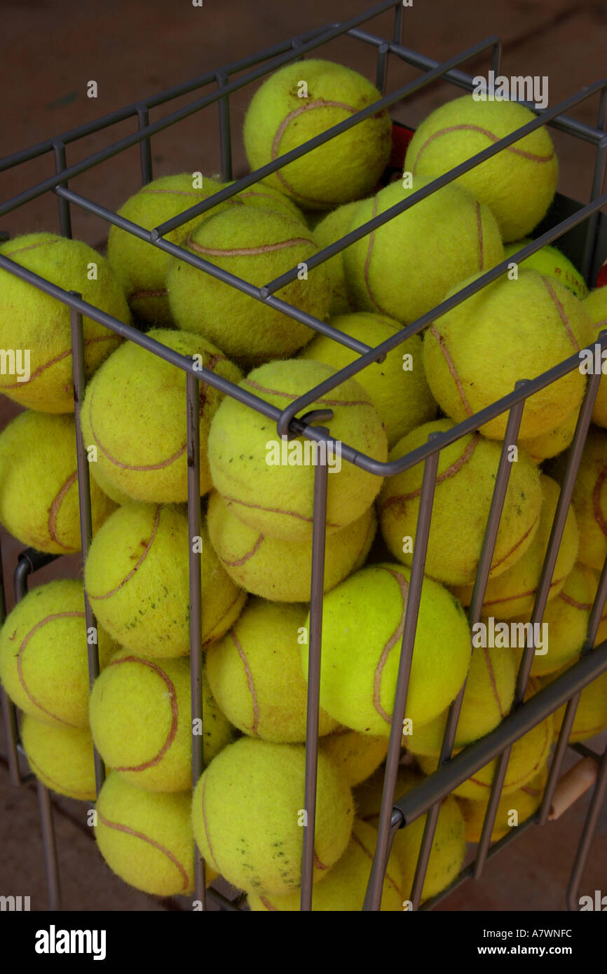 tennis balls basket Stock Photo - Alamy