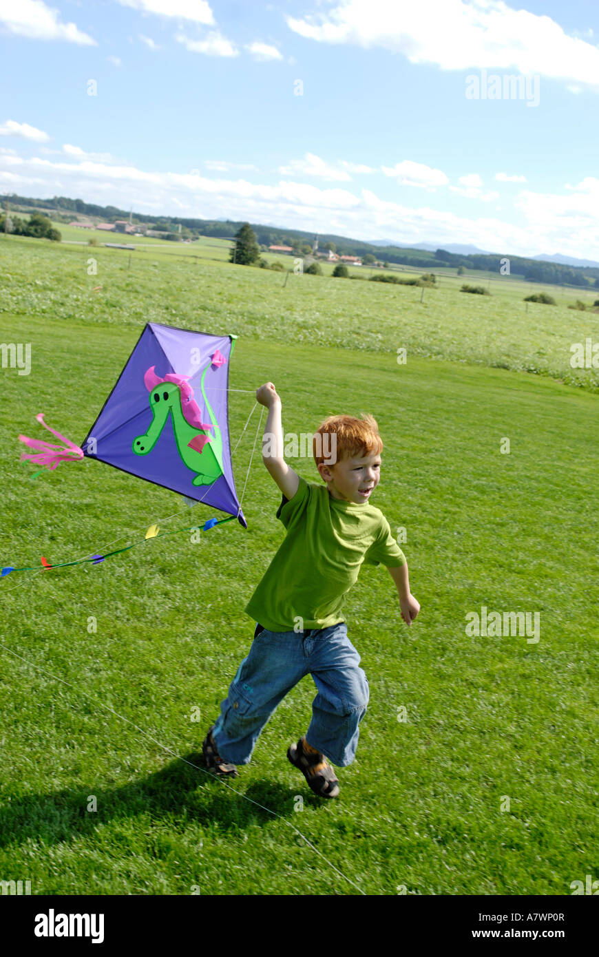Little boy with a kite Stock Photo - Alamy
