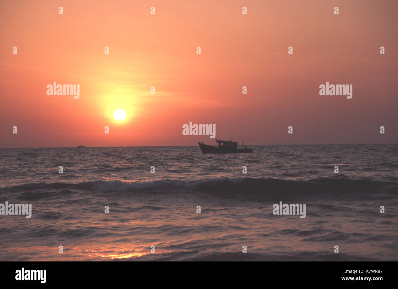 GOA The sun sets over the Arabian Sea on Colva Beach Stock Photo - Alamy