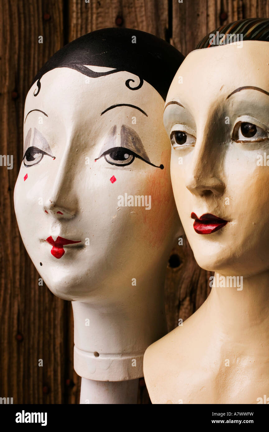 Two doll heads Stock Photo - Alamy