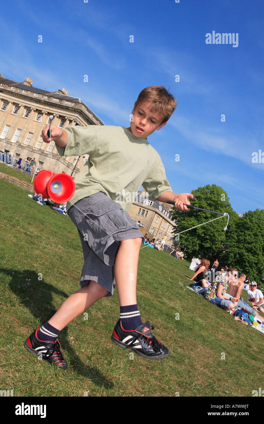 Young boy playing with a diabolo spinning toy in Victoria Park Bath ...