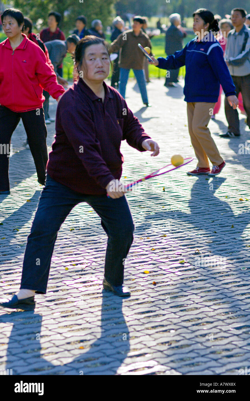 CHINA BEIJING Chinese men and women of all ages exercise by balancing a ...