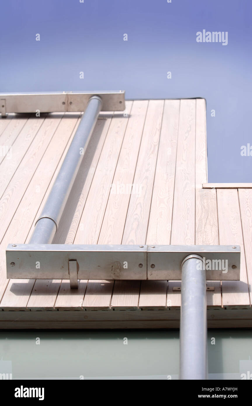 A CONTEMPORARY GEOMETRIC HOME WITH WOOD CLADDING AND ALUMASC ALUMINIUM ...