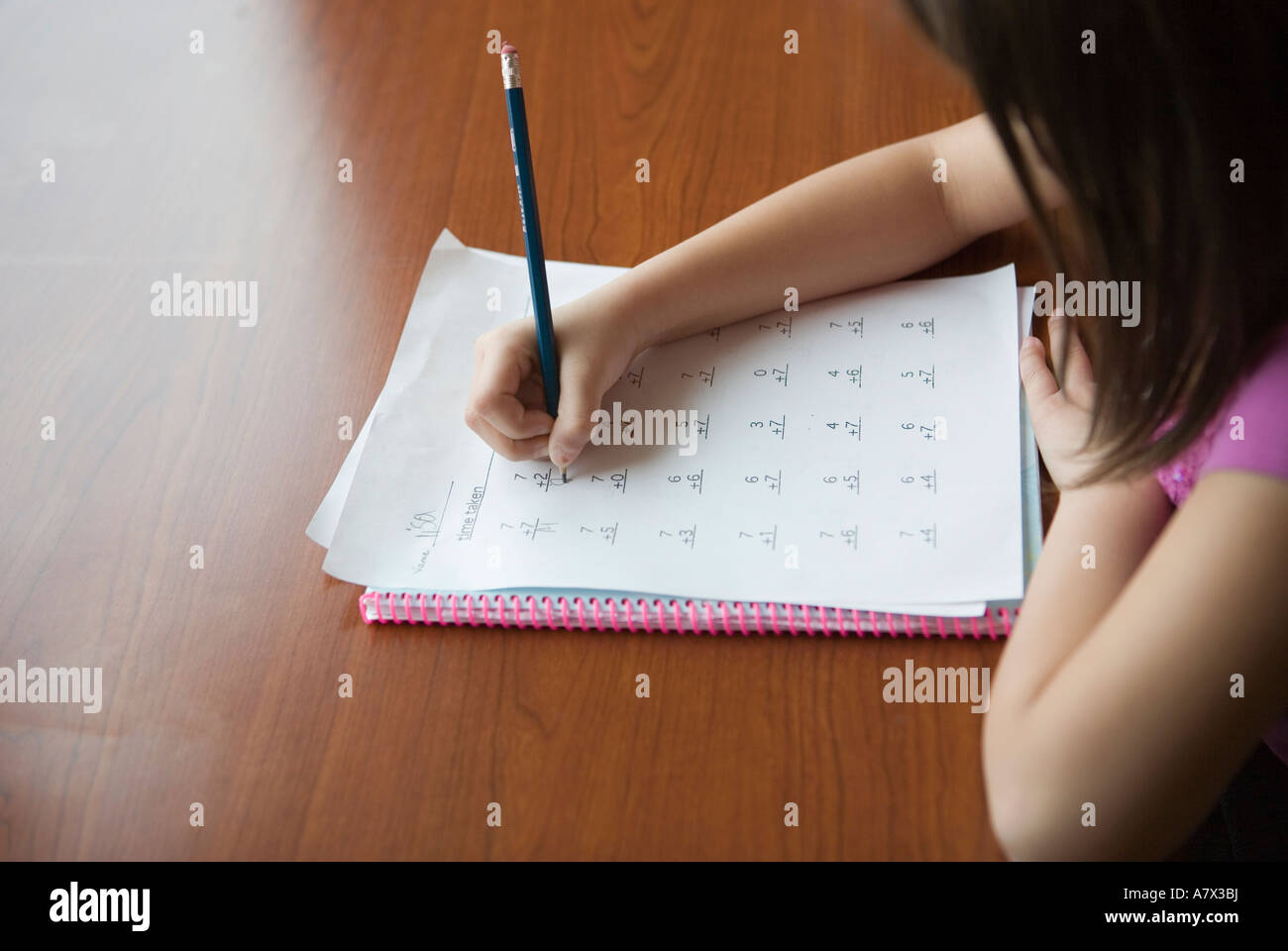Child working on math homework hi-res stock photography and images - Alamy