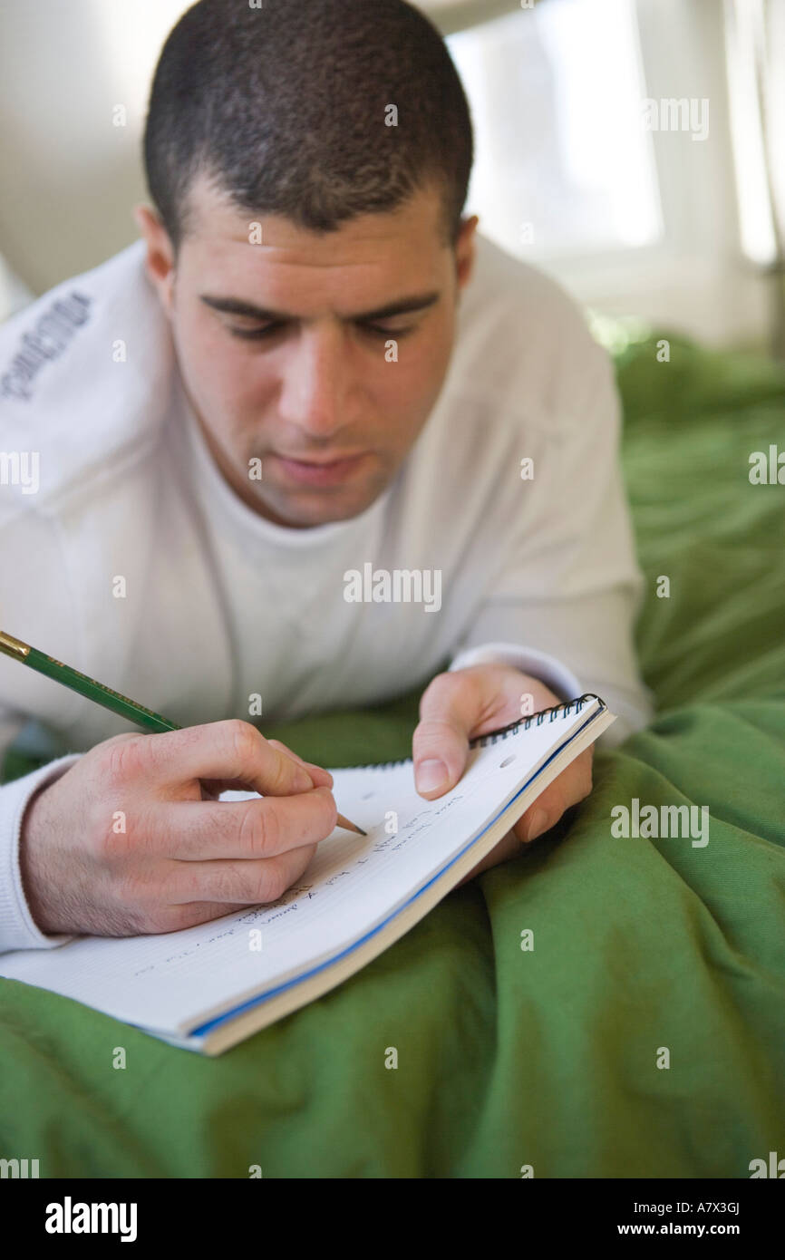 man writing at home Stock Photo - Alamy