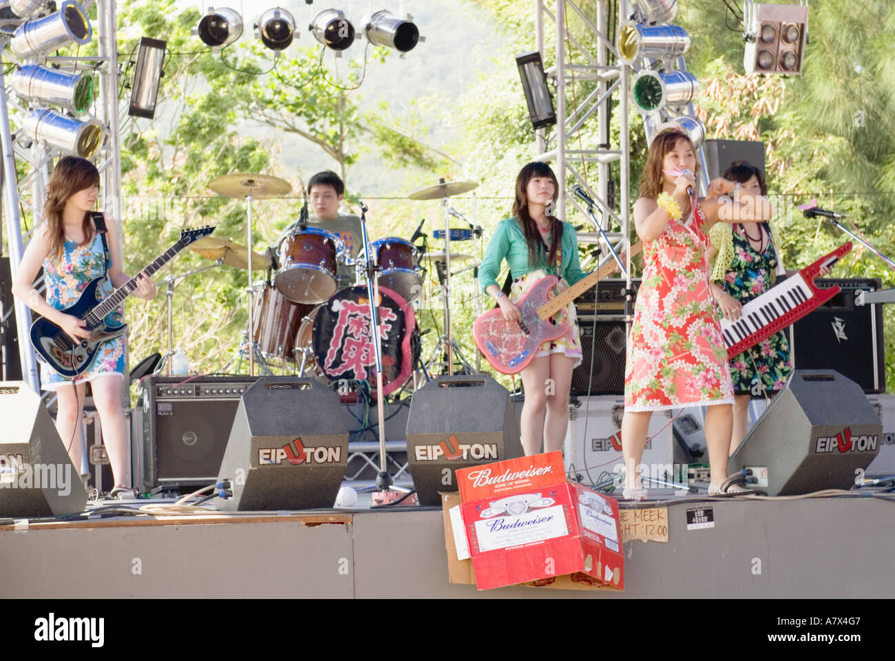 Chinese Girl Rock n Roll Band Performing Concert On Stage Kenting ...