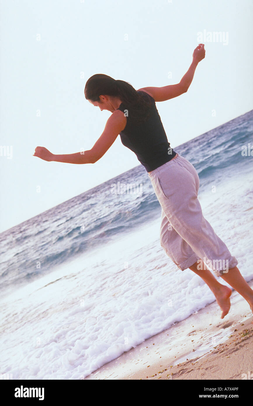 People wading through the sea hi-res stock photography and images - Alamy