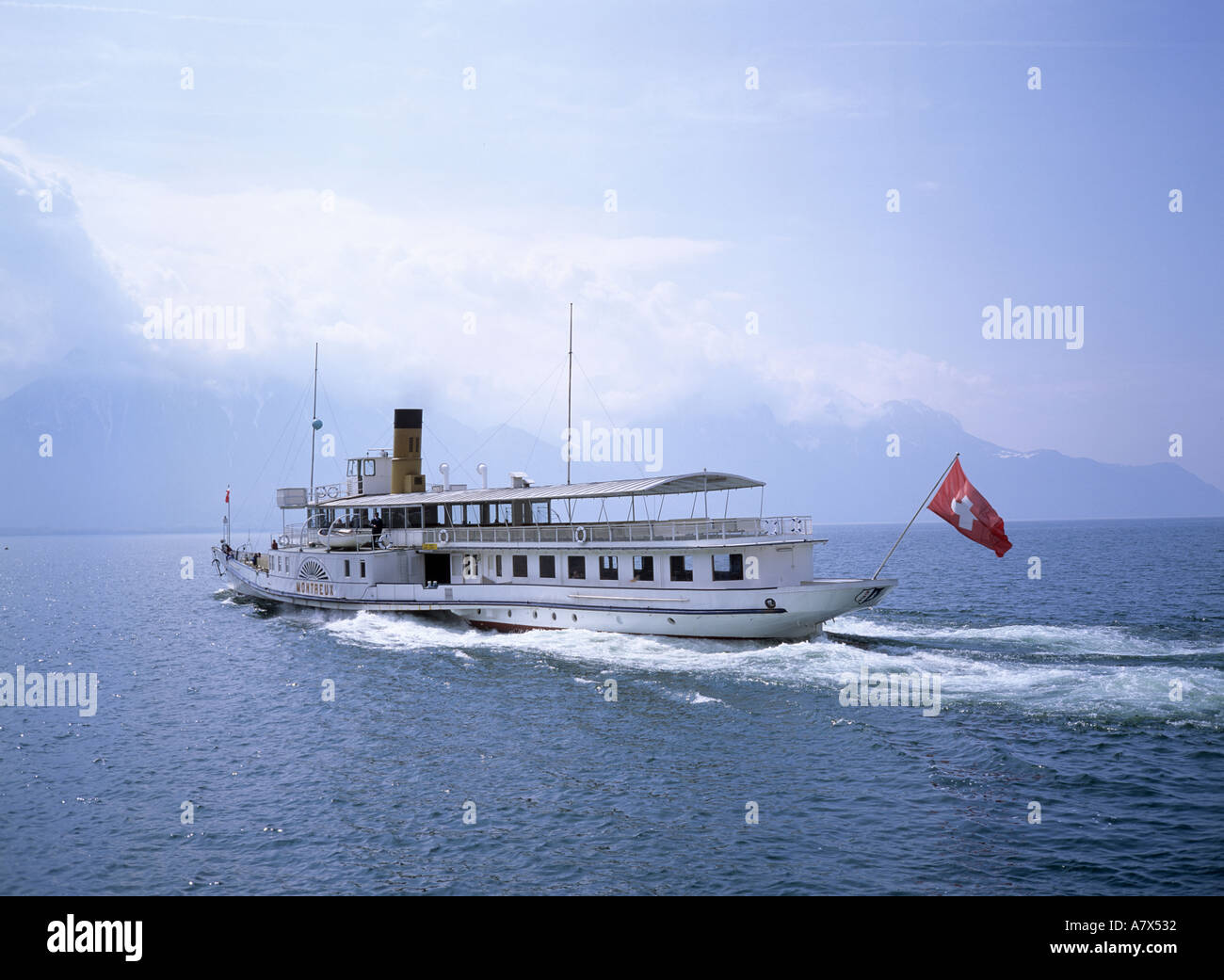 Paddle steamer flying the Swiss flag on Lake Geneva Switzerland Stock ...