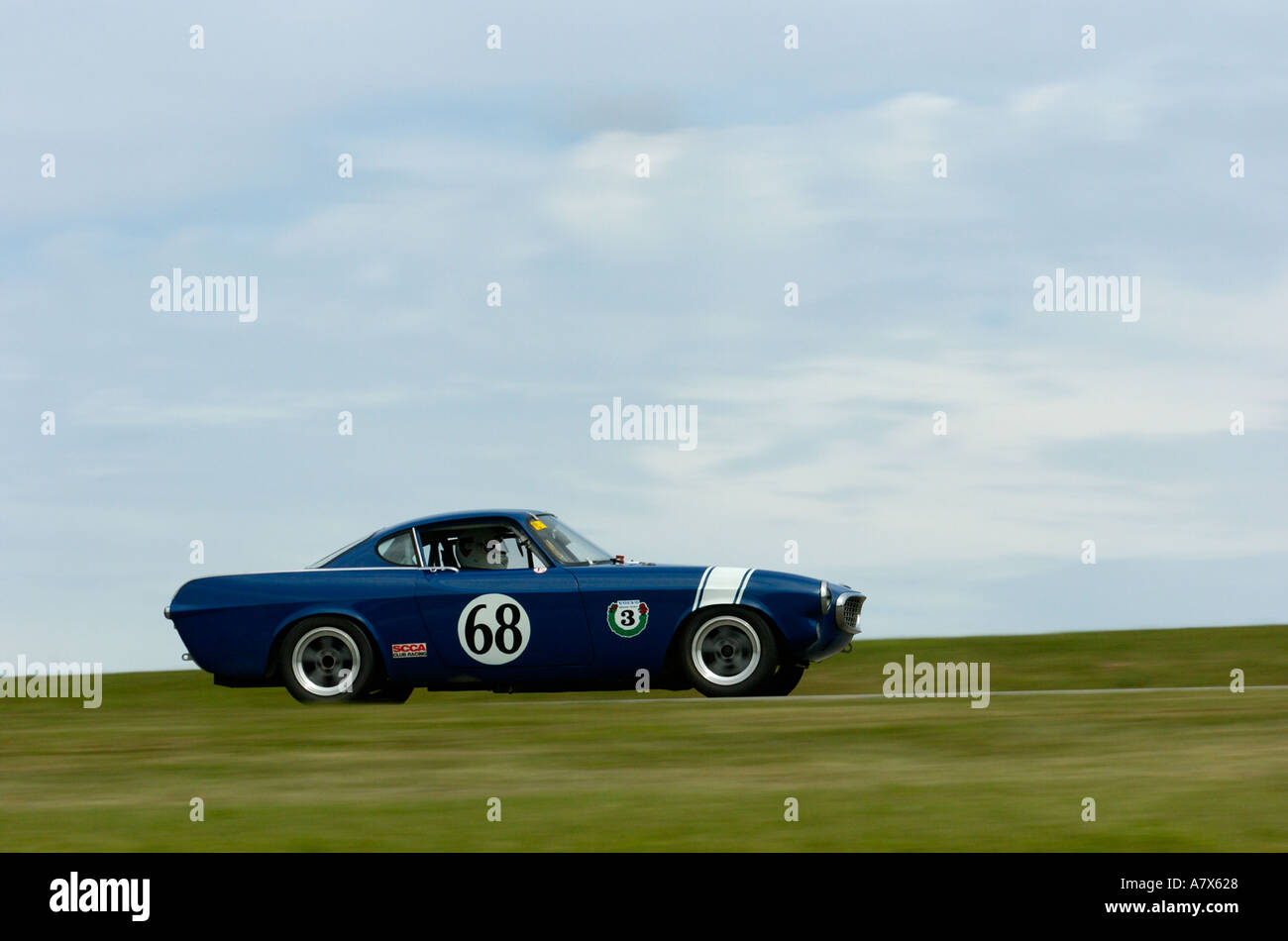 Richard Conklin races his 1965 Volvo P1800 at the Vintage Grand Prix Au ...
