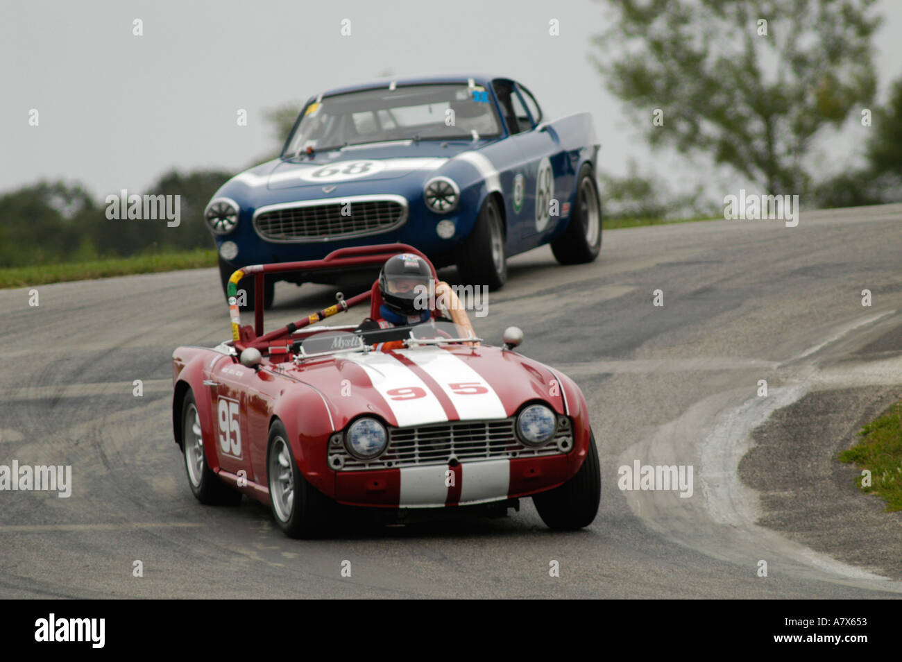 Tony Drews in his 1963 Triumph TR4 followed by Richard Conklin in his ...