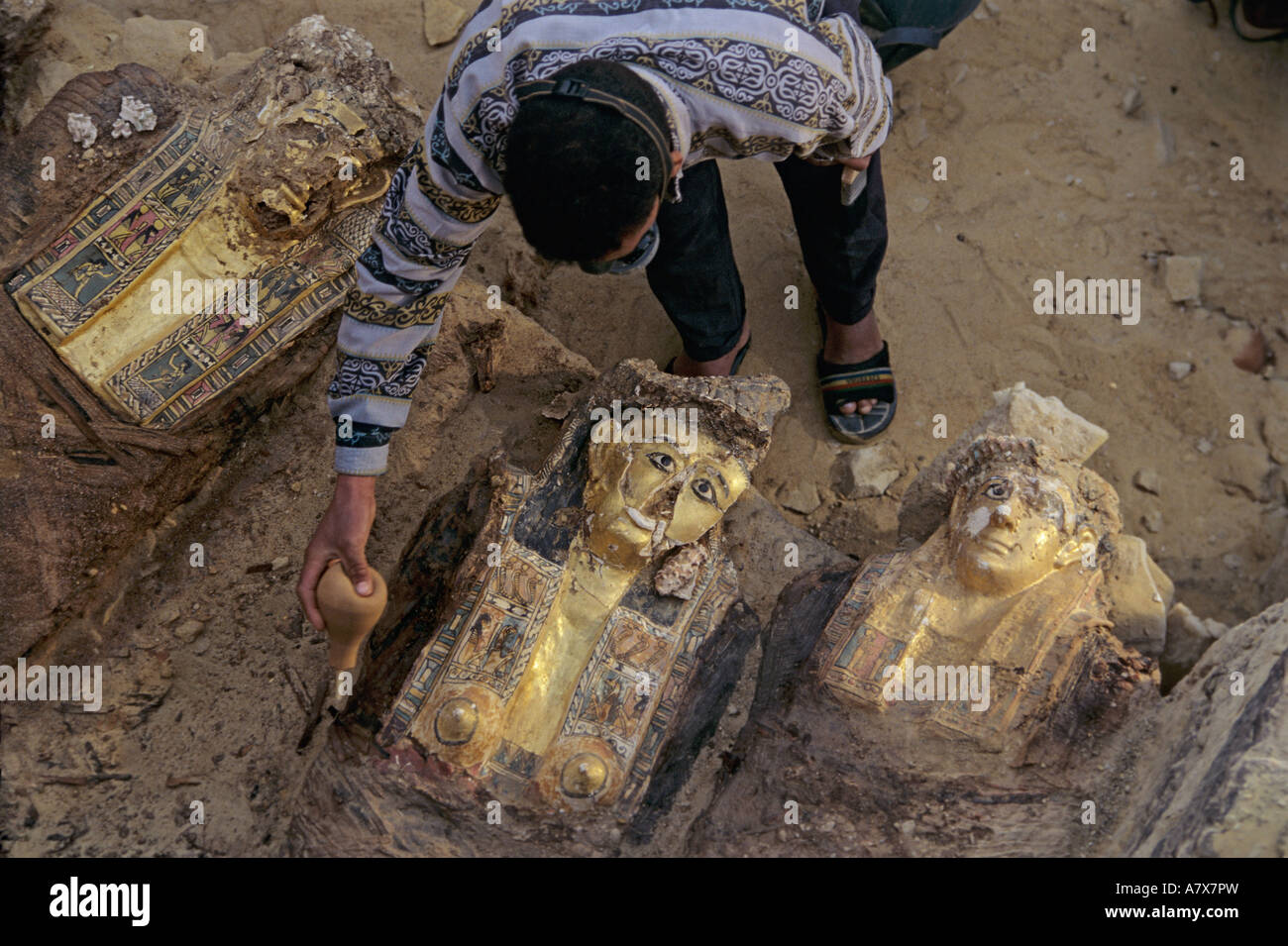 Egypt, Sand is cleared from mummies of a married couple Stock Photo - Alamy