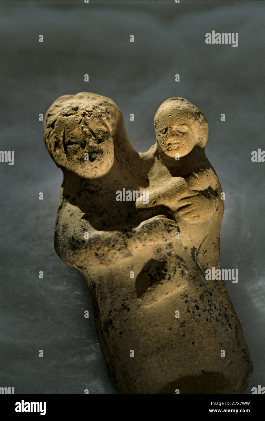 Egypt, Statue of goddess Isis holding Horus, clay mummies Stock Photo ...