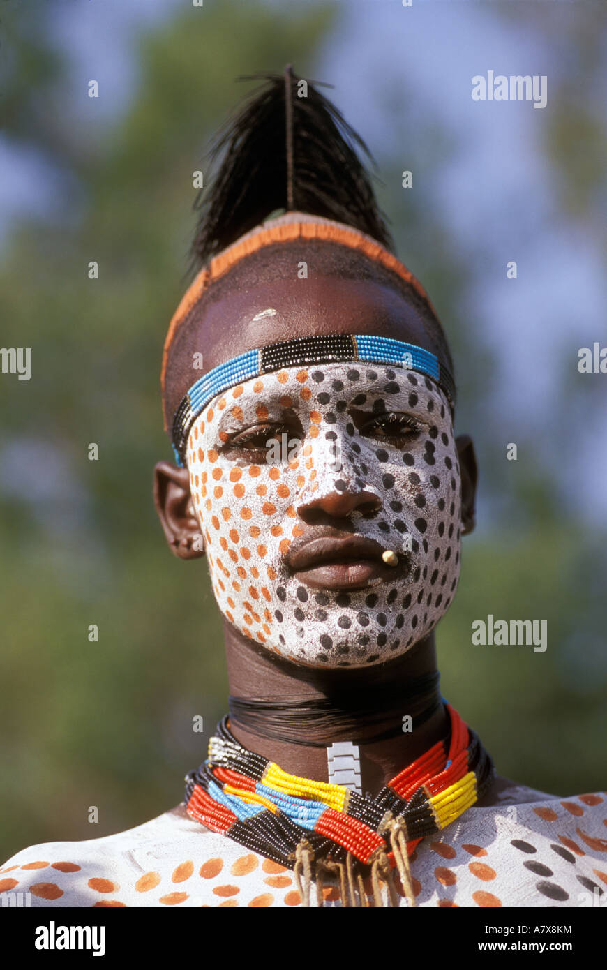 Portrait of a Karo warrior wearing traditional body paint, near his ...