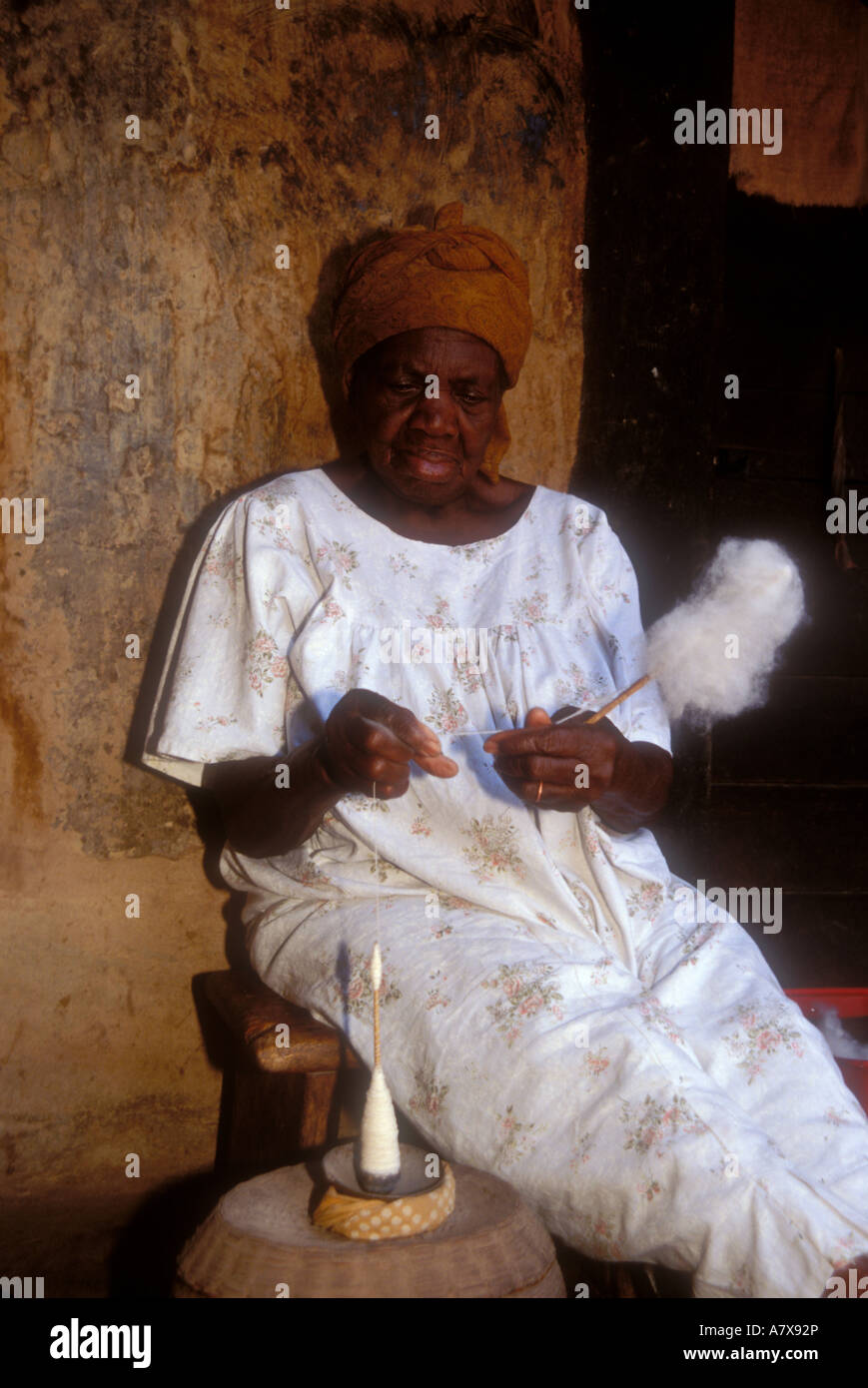 Ghana: Boku (Borongo-Ahafo Region), elder grandmother spinning yarn ...