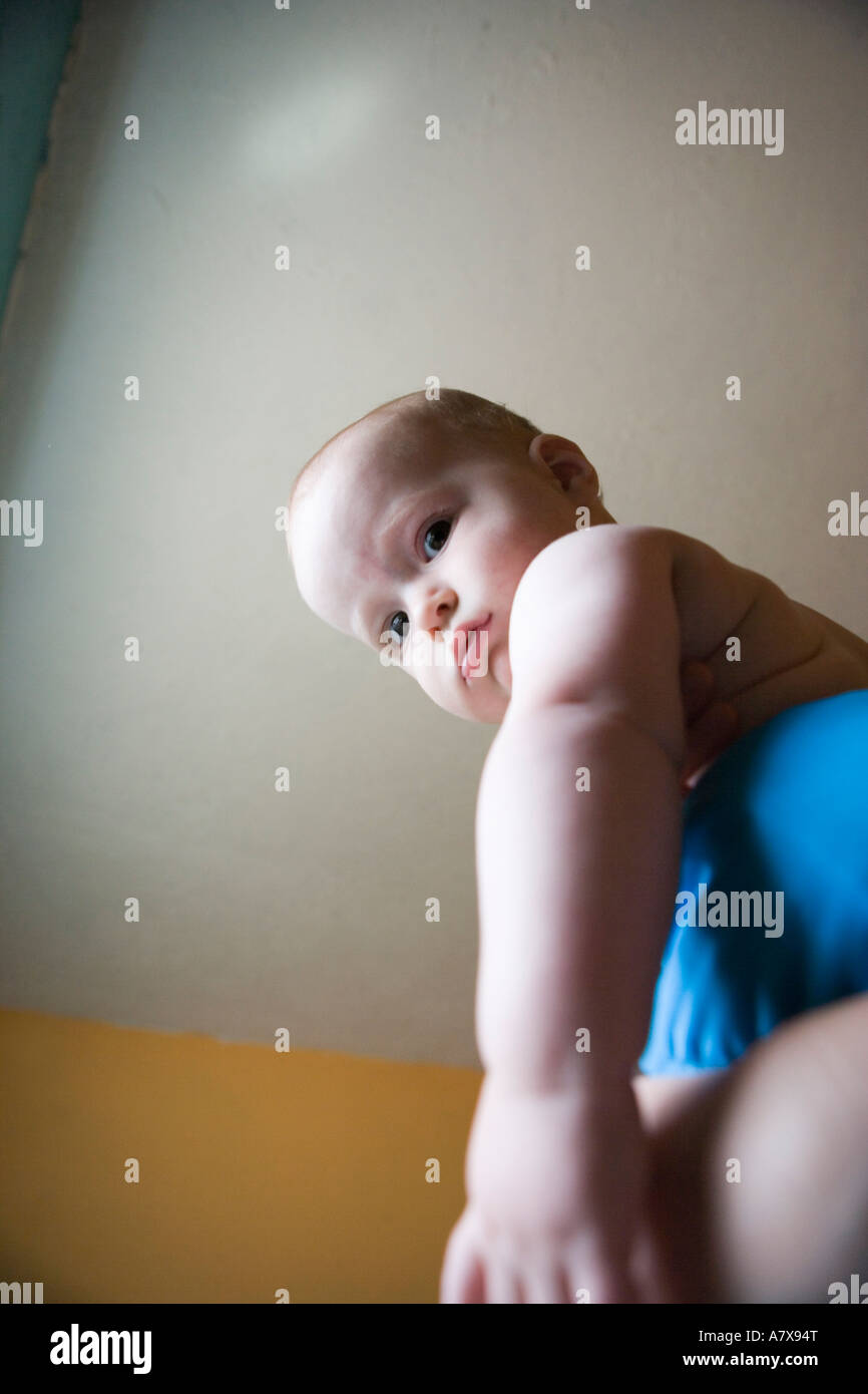 baby boy looking down Stock Photo - Alamy