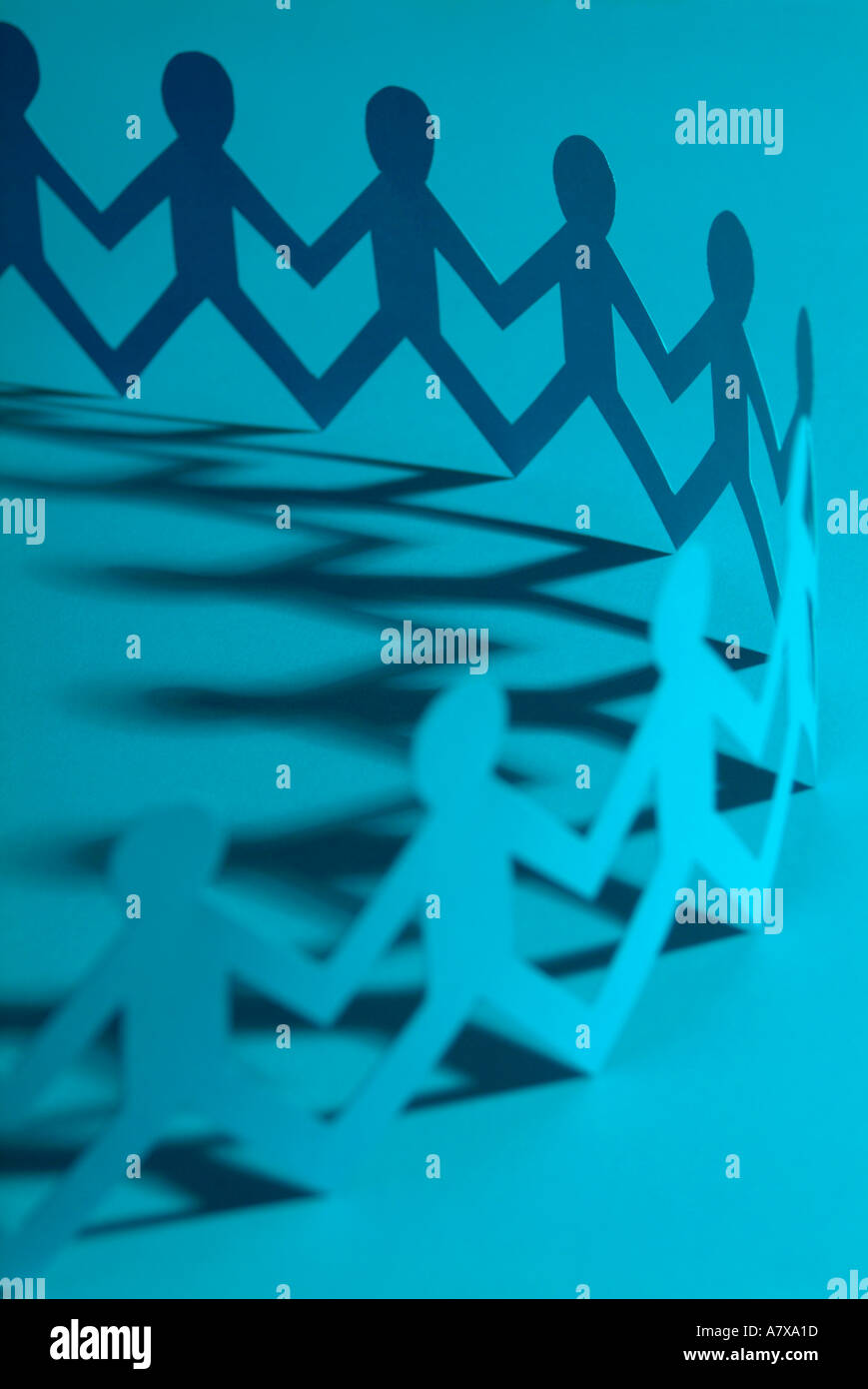 Paper chain people Stock Photo - Alamy