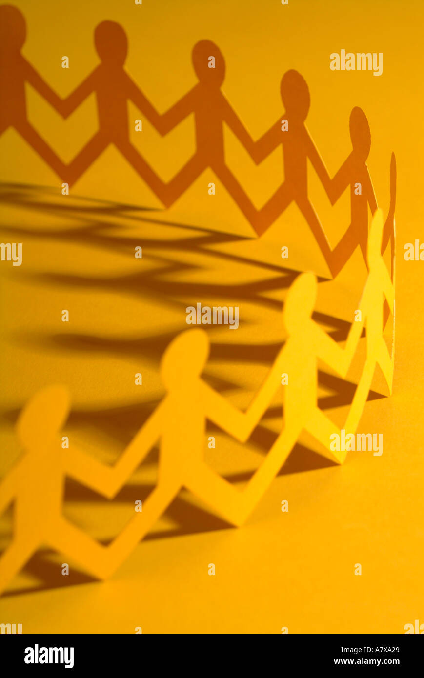 Paper chain people Stock Photo - Alamy