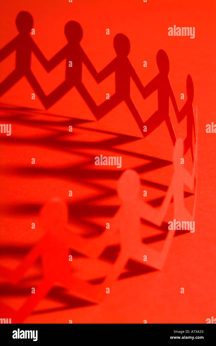 Paper chain people Stock Photo - Alamy