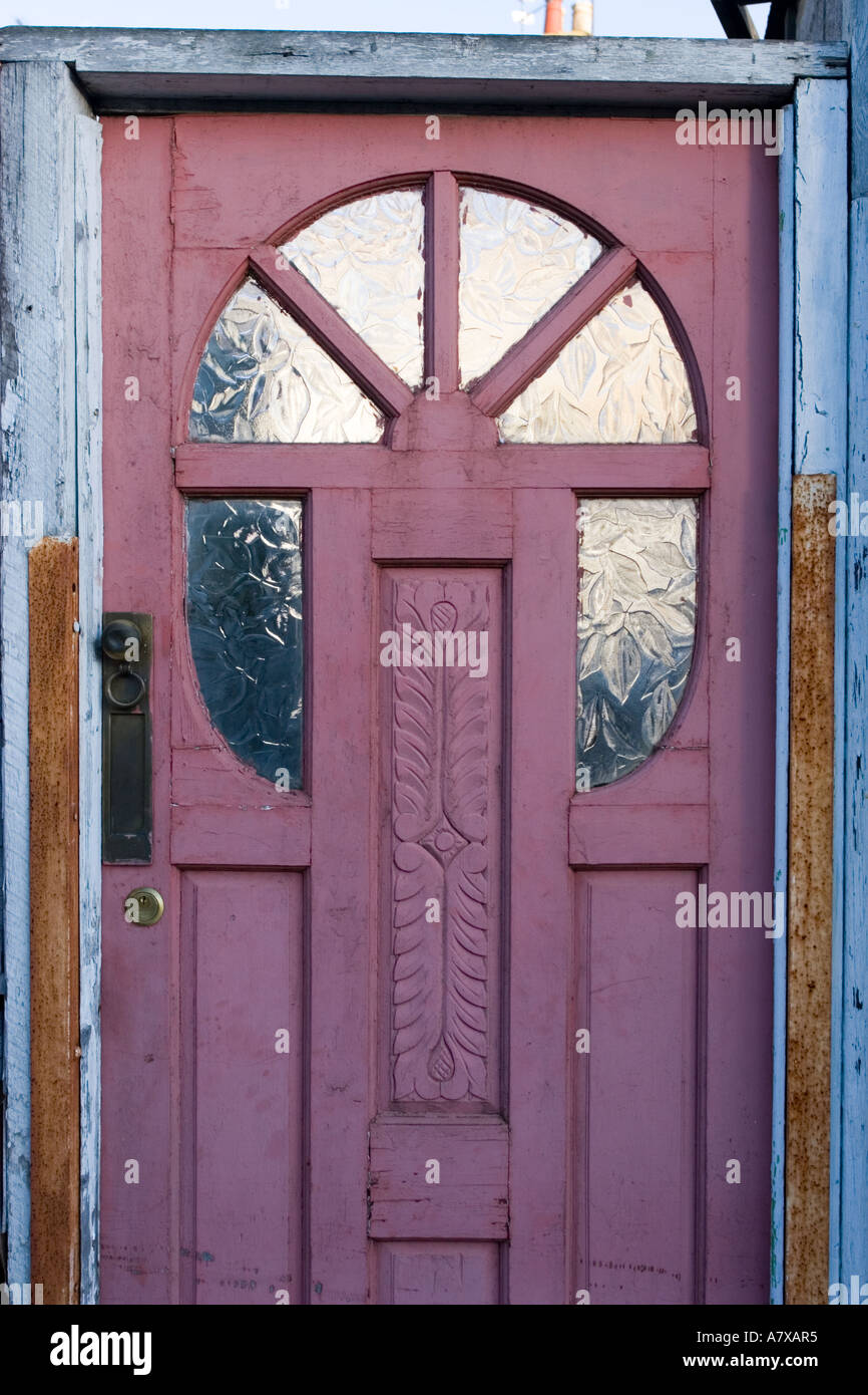 Old front doors recycled as back garden gates Stock Photo - Alamy