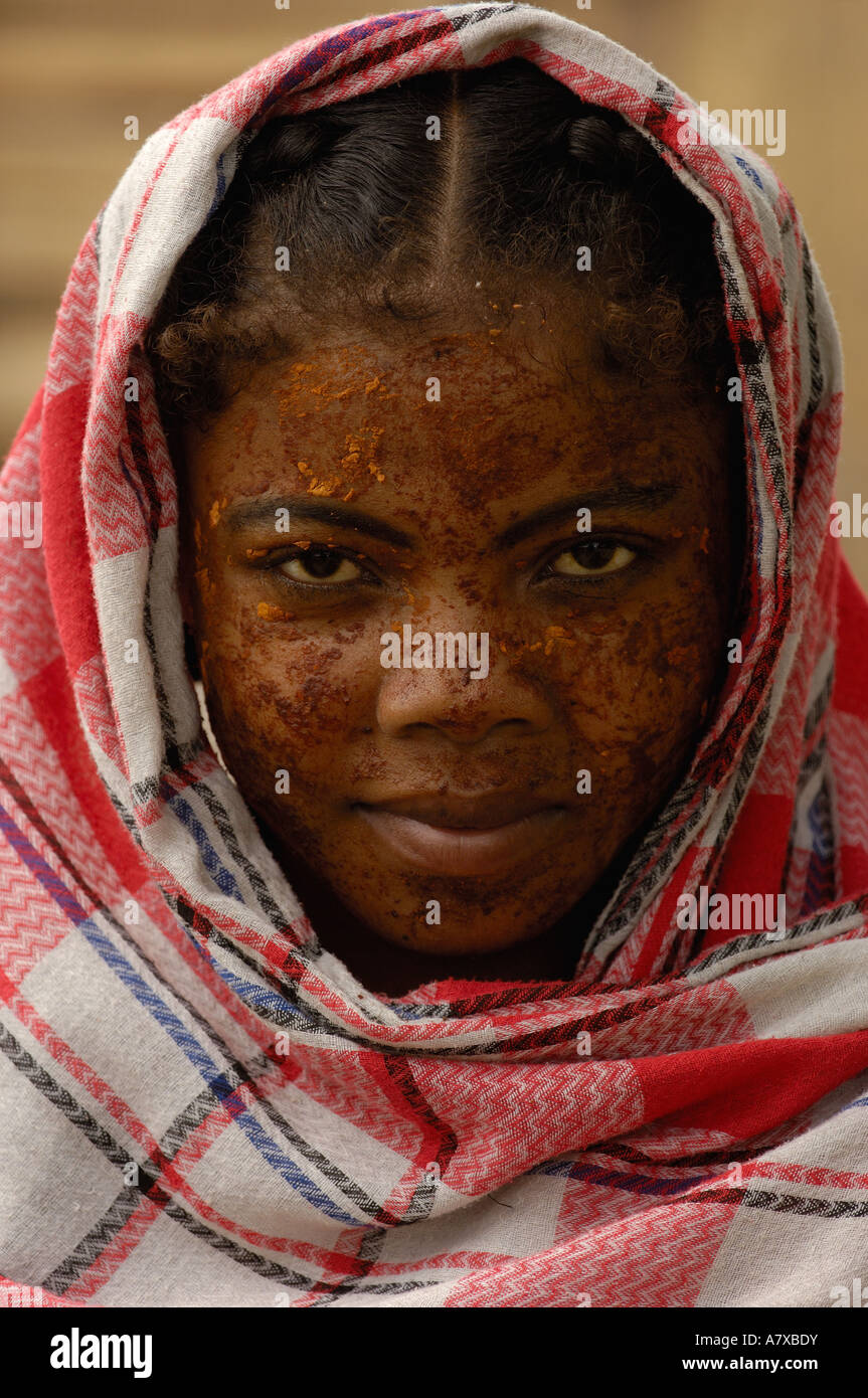 Mahafaly woman wearing sandalwood face paste to protect from the sun ...