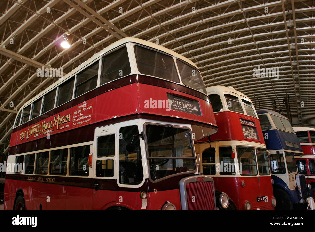 Buses and trams on display in a transport museum Stock Photo - Alamy