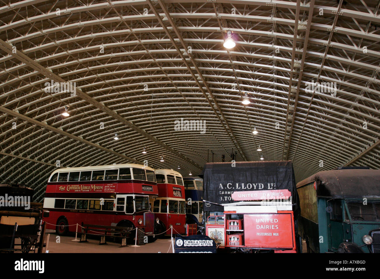 Buses and trams on display in a transport museum Stock Photo - Alamy